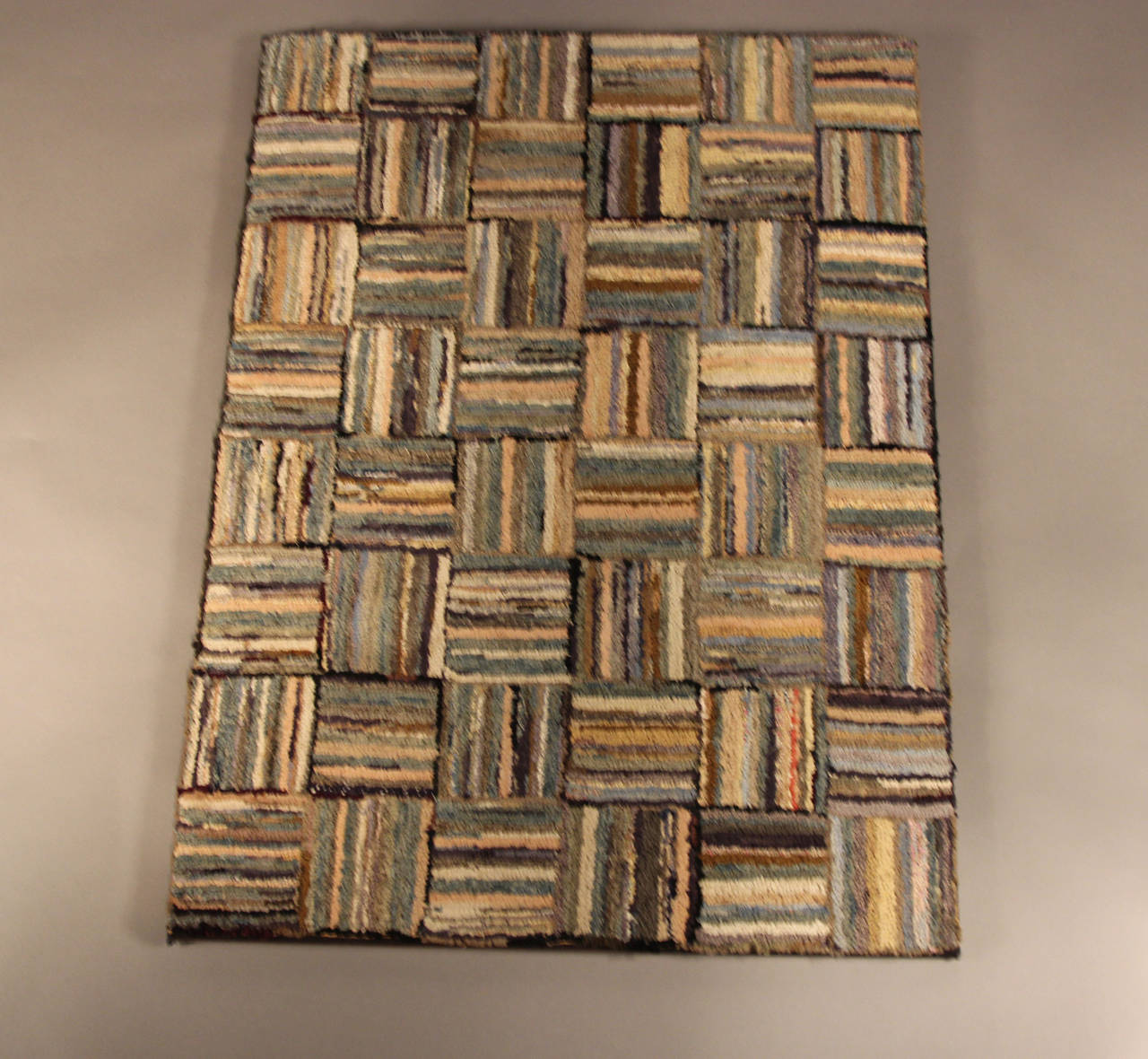 Mounted Geometric Hooked Rug For Sale at 1stDibs