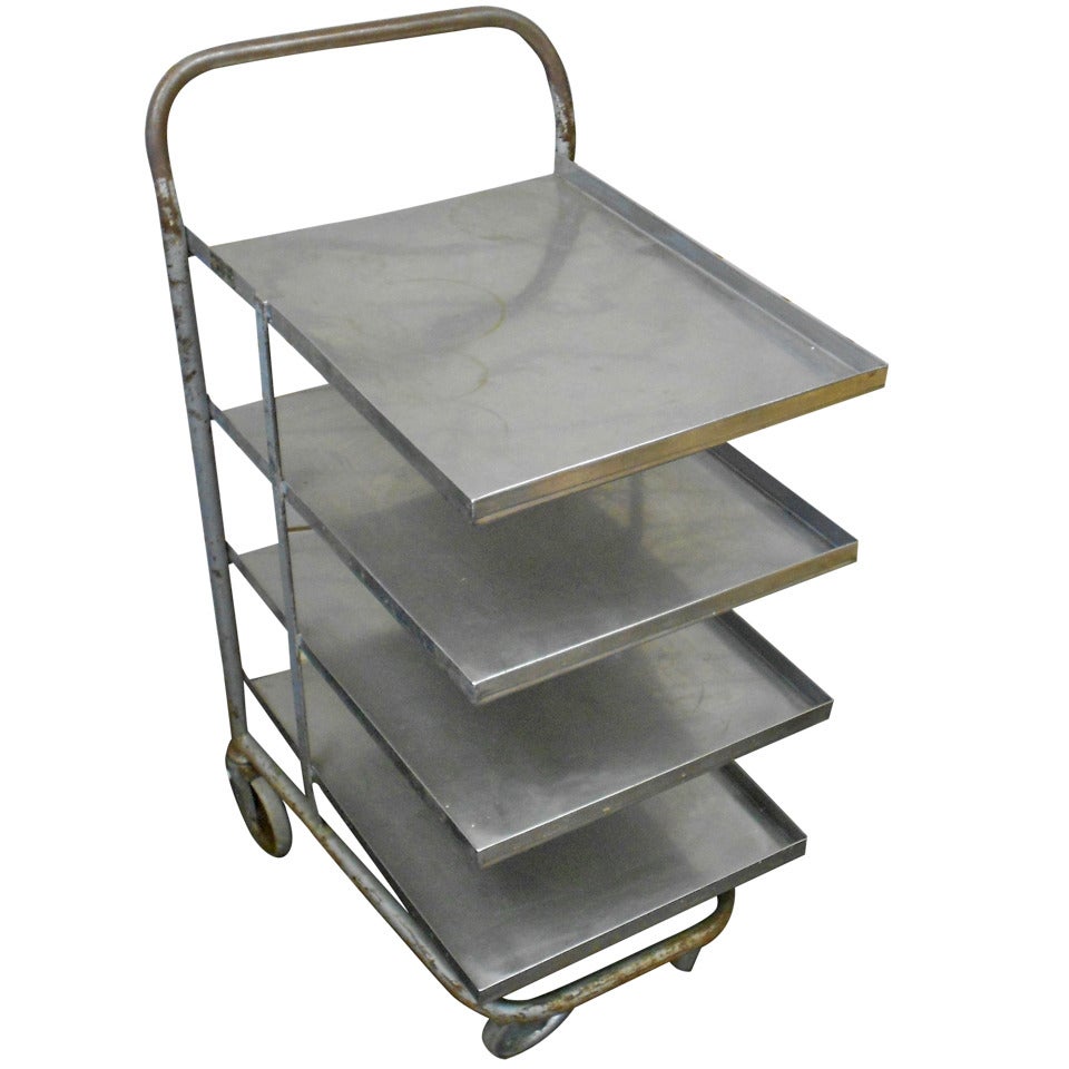 Mid-Century Stainless Steel Cart on pivoting wheels at 1stDibs
