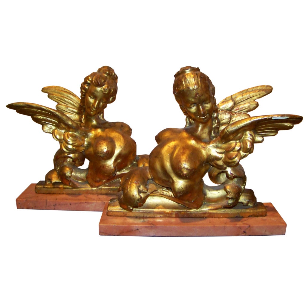 Pair of carved gilt sphinx For Sale at 1stDibs