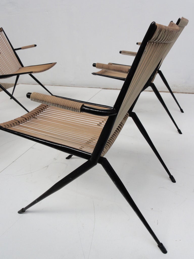 French 50's plastic corded (outdoor) easy chairs at 1stDibs