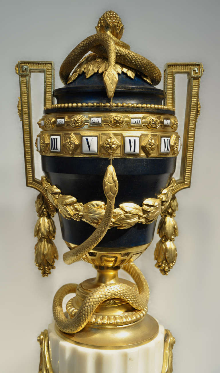 Exceptional Antique Clock with Snakes and Rotary Dials at 1stdibs