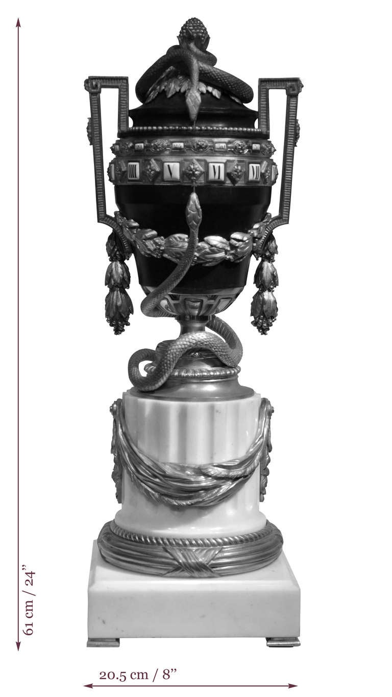 Exceptional Antique Clock with Snakes and Rotary Dials at 1stDibs