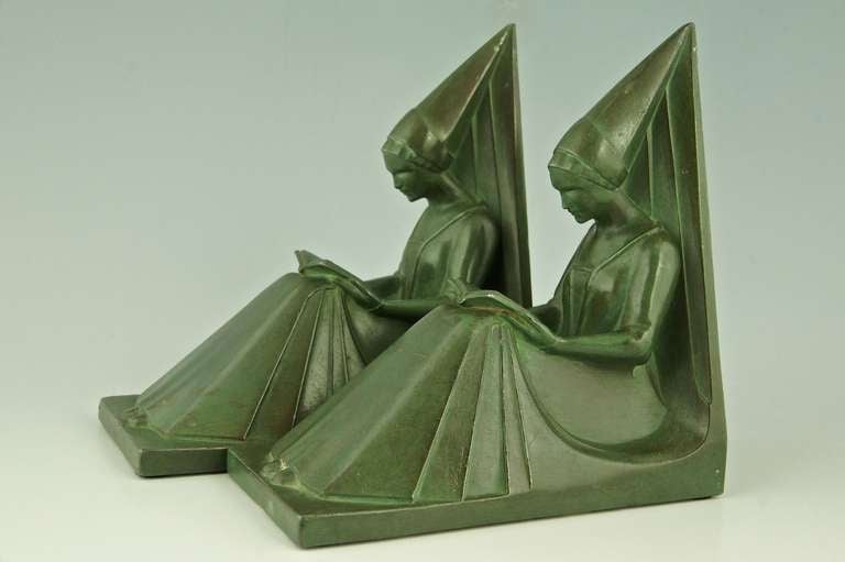 A pair of Art Deco bookends with reading ladies by Max Le Verrier. at ...