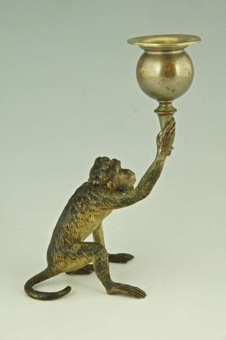 Vienna bronze of a monkey with candlestick holder. at 1stDibs