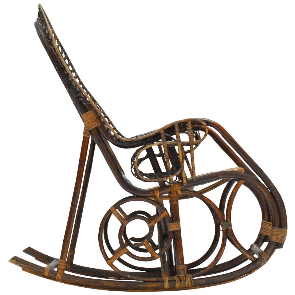 Important Articulated Rattan 1950s Colonial Rocking Chair For Sale at ...