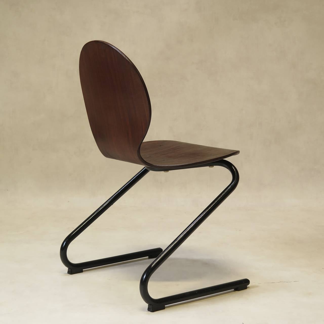 Four Mid-Century Plywood and Metal Cantilever Spring Chairs at 1stDibs