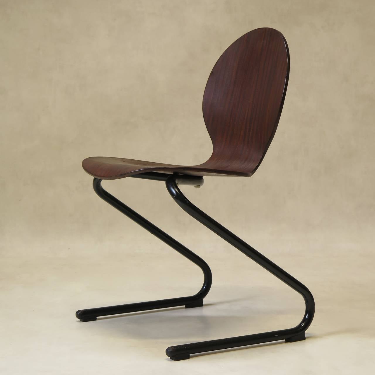 Four Mid-Century Plywood and Metal Cantilever Spring Chairs at 1stDibs