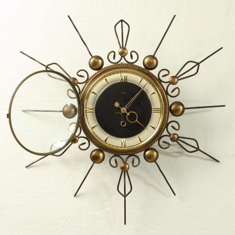 Beautiful 'Sunburst' 0rfac clock 1950's in brass metal at 1stDibs