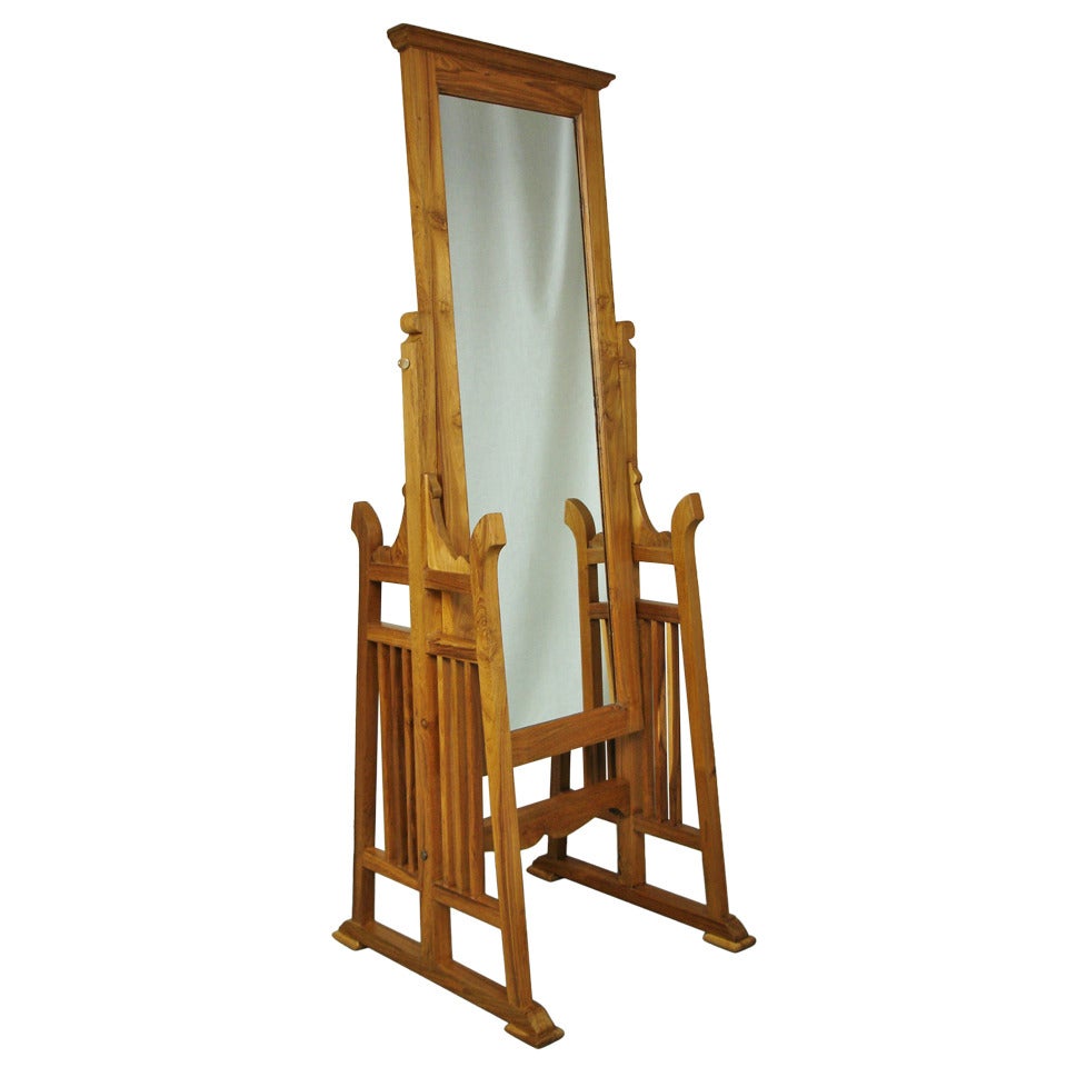 An arts and crafts cheval mirror at 1stDibs