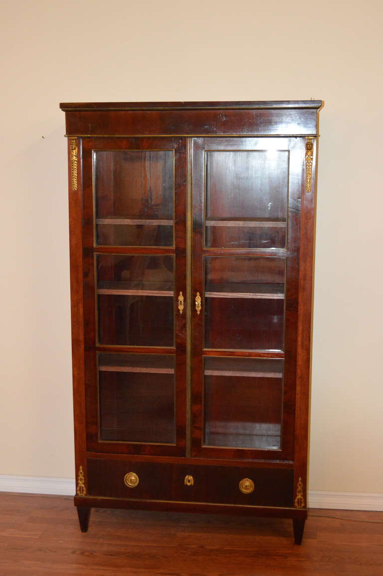Empire style mahogany bookcase at 1stDibs