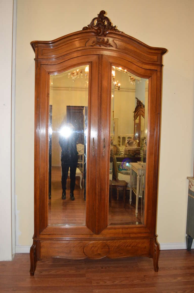 Louis XV style walnut armoire at 1stDibs