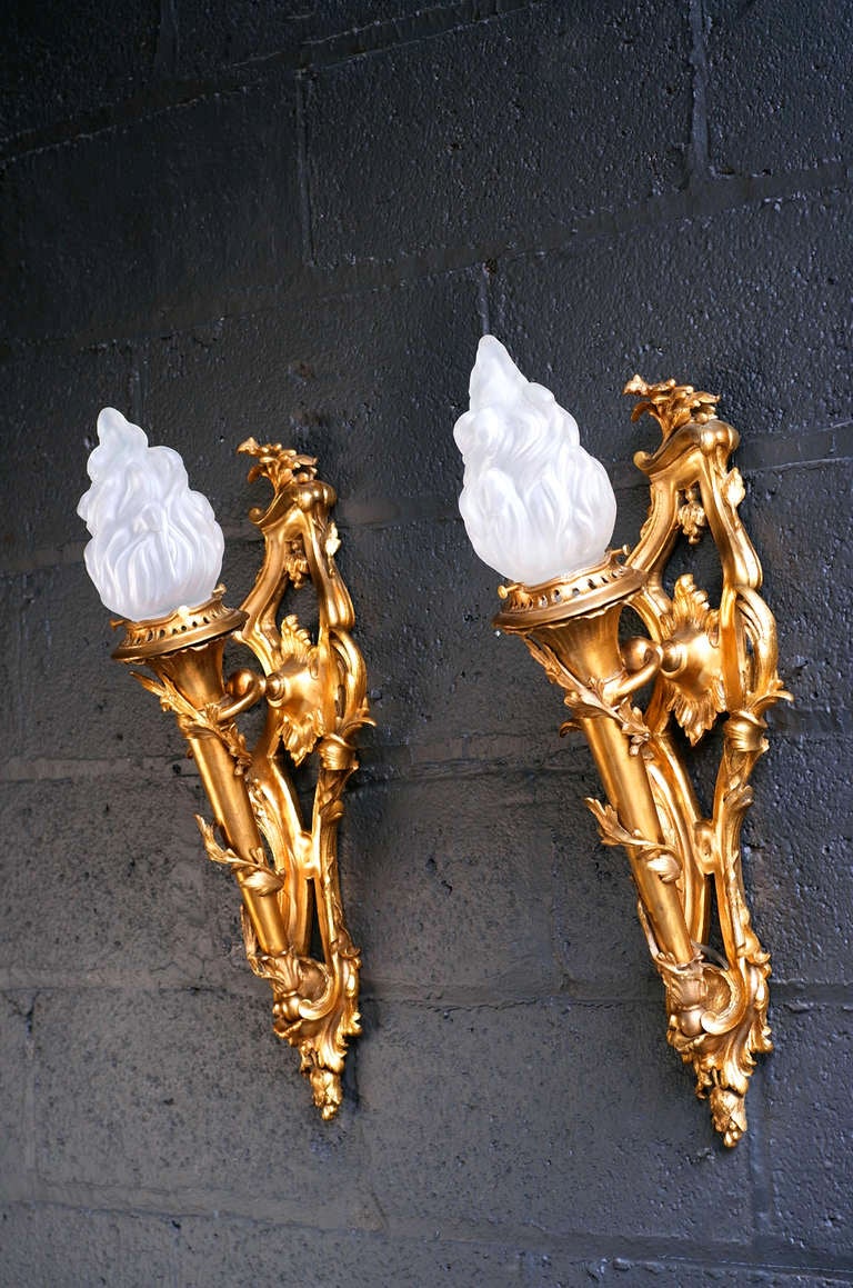 Flaming Bronze Torch Sconces at 1stDibs