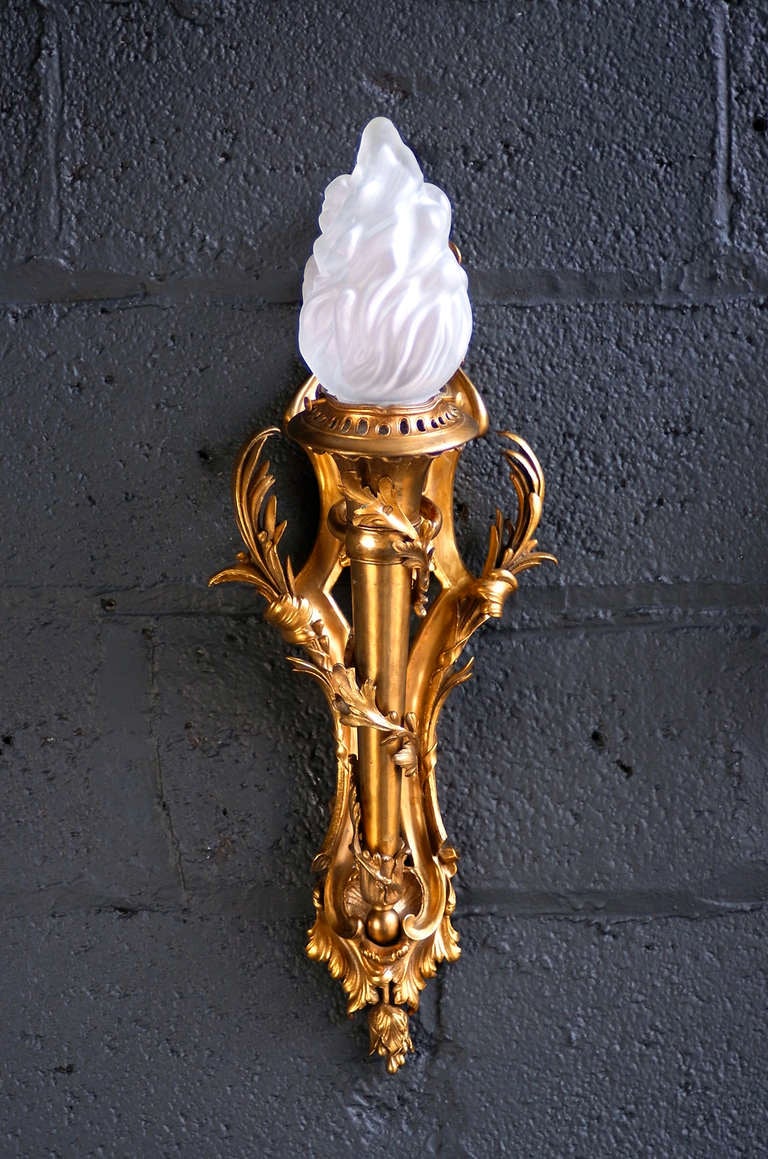 Flaming Bronze Torch Sconces at 1stDibs