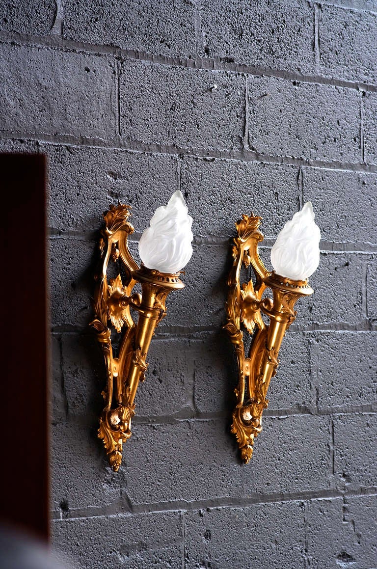Flaming Bronze Torch Sconces at 1stDibs