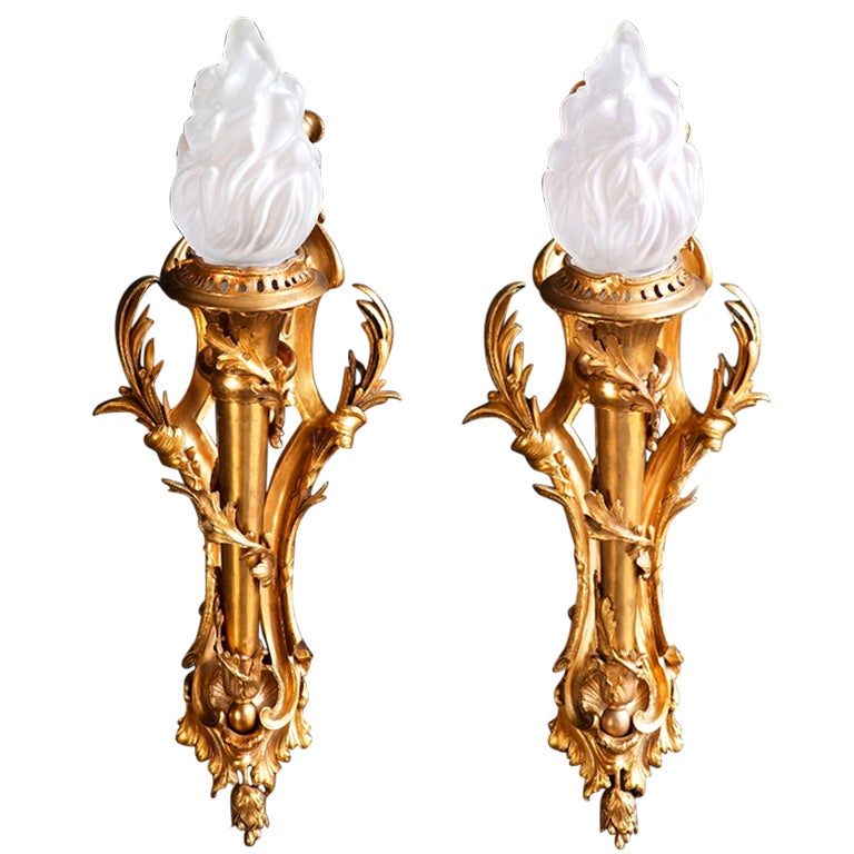 Flaming Bronze Torch Sconces at 1stDibs