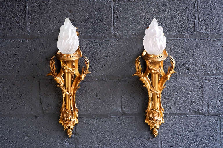 Flaming Bronze Torch Sconces at 1stDibs