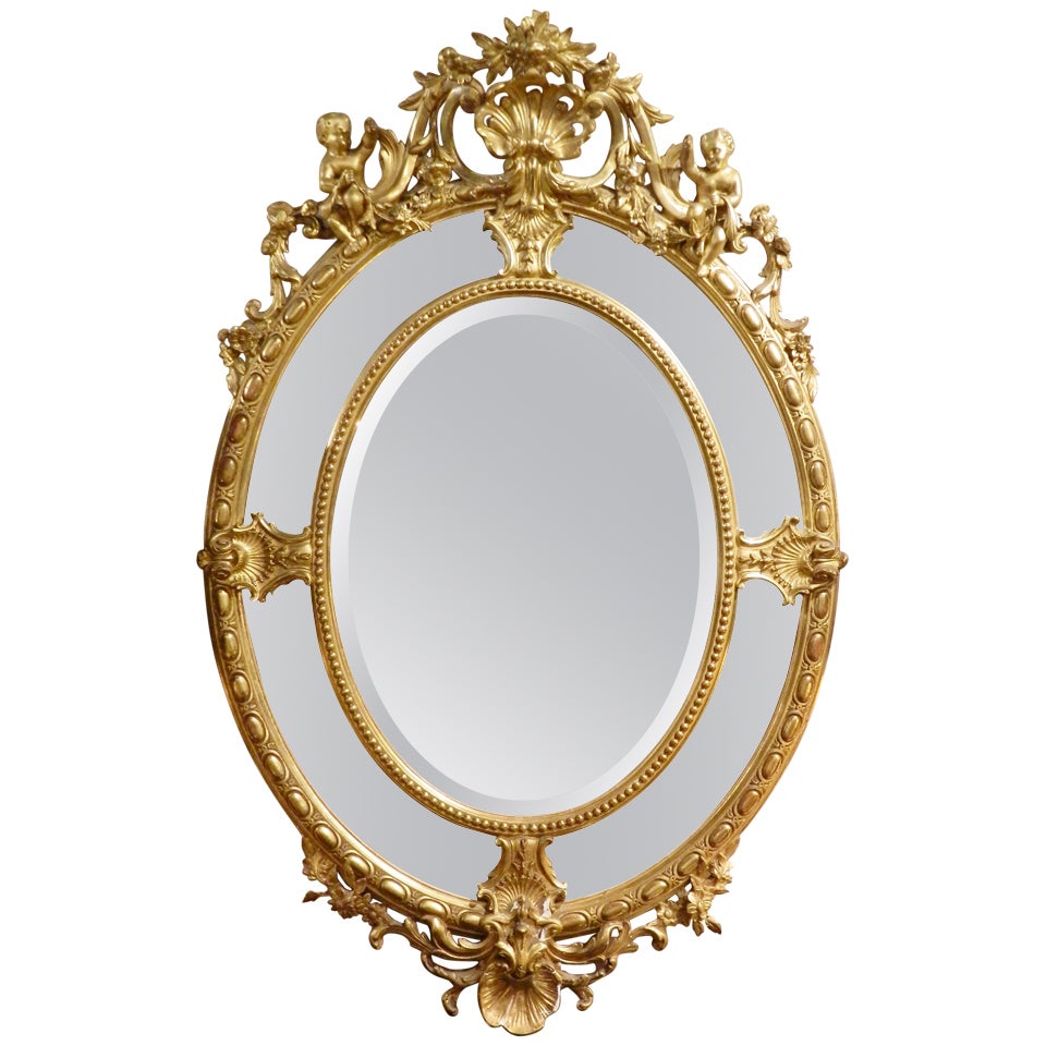 Flower and Bird Adorned Ornate Tole Gilt Mirror at 1stDibs
