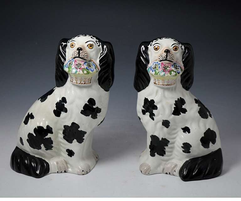 Pair of antique Staffordshire pottery figures of spaniel dogs with ...