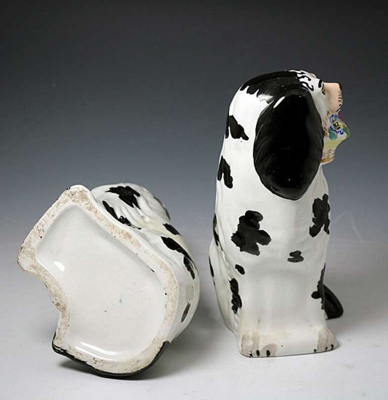 Pair of antique Staffordshire pottery figures of spaniel dogs with ...