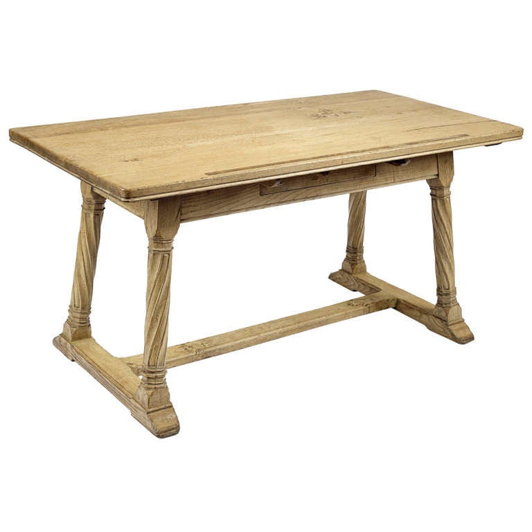 A bleached oak draper's table designed for Liberty's by Sir Robert ...