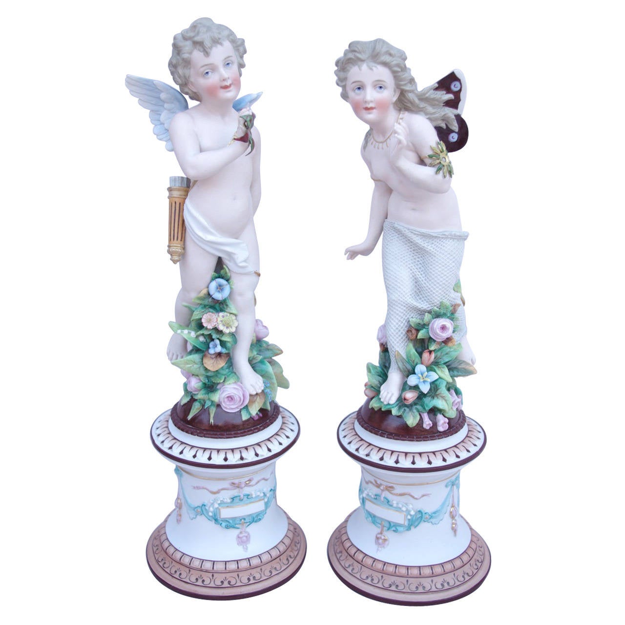 Pair of sculptures in biscuit "Psyche and Cupid" circa 1900 at 1stDibs