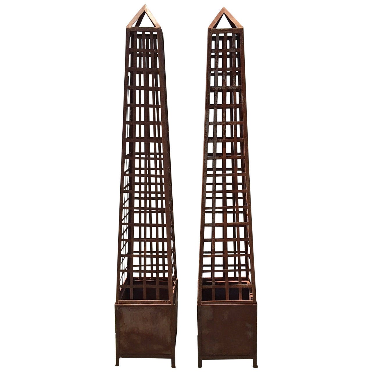 Pair of Monumental Iron Latticework Obelisks with Planters at 1stDibs