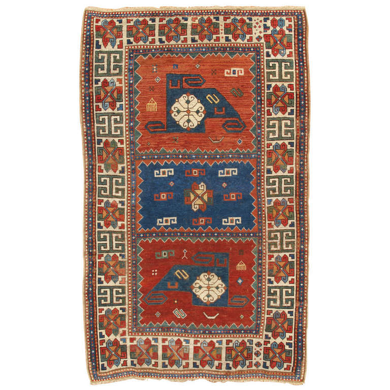 Antique Russian Pinwheel Kazak Rug at 1stdibs