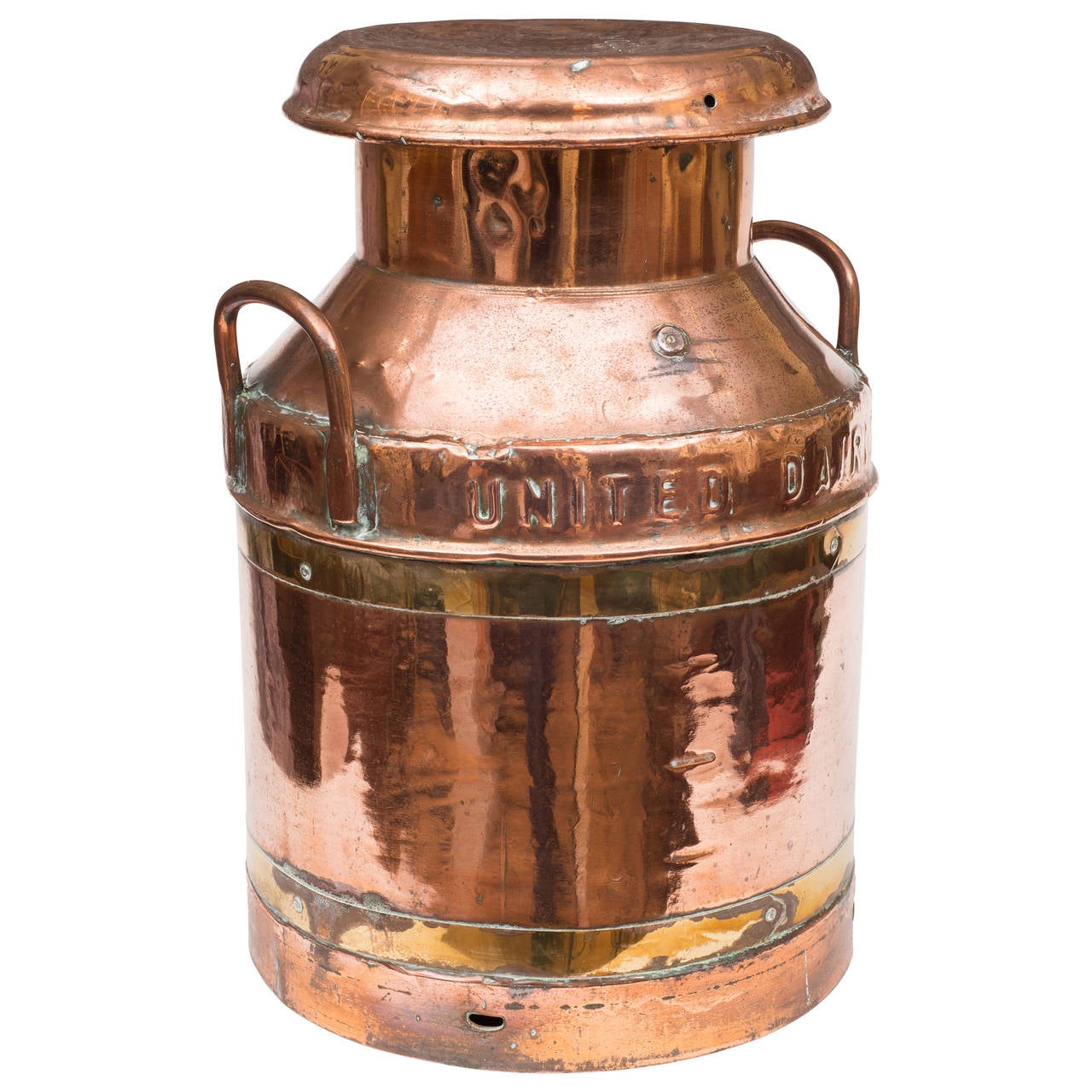 A brass and copper milk churn at 1stDibs