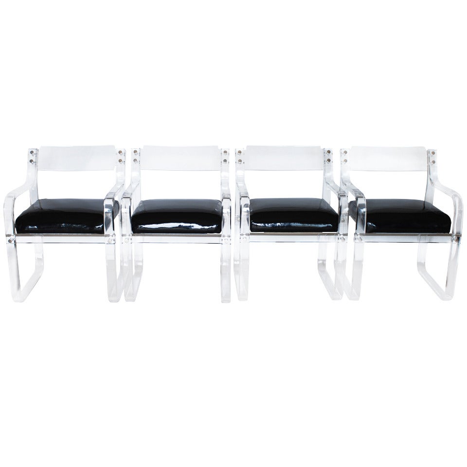 Set of Four Lucite Chairs at 1stDibs