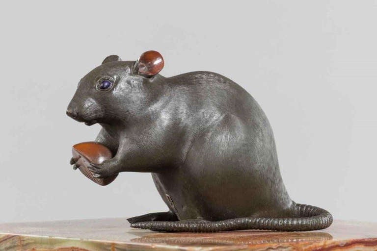 A Meiji period bronze of a rat holding a chestnut at 1stDibs