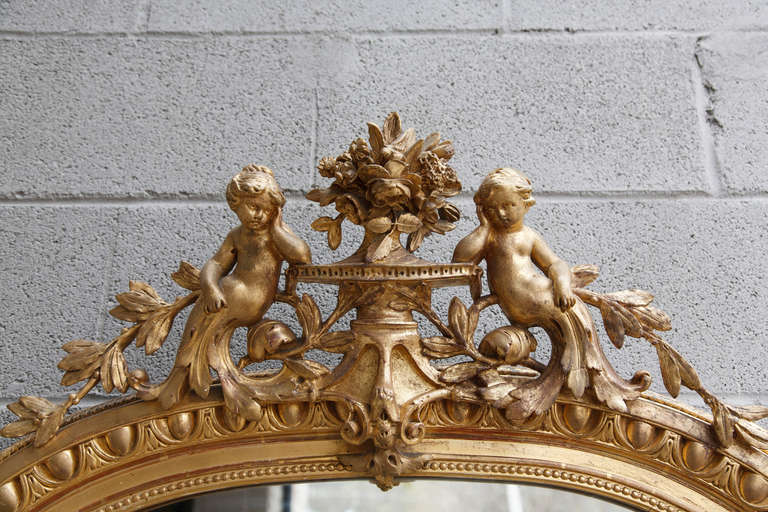 19th Century Giltwood Louis XVI Mirror with Putti at 1stDibs