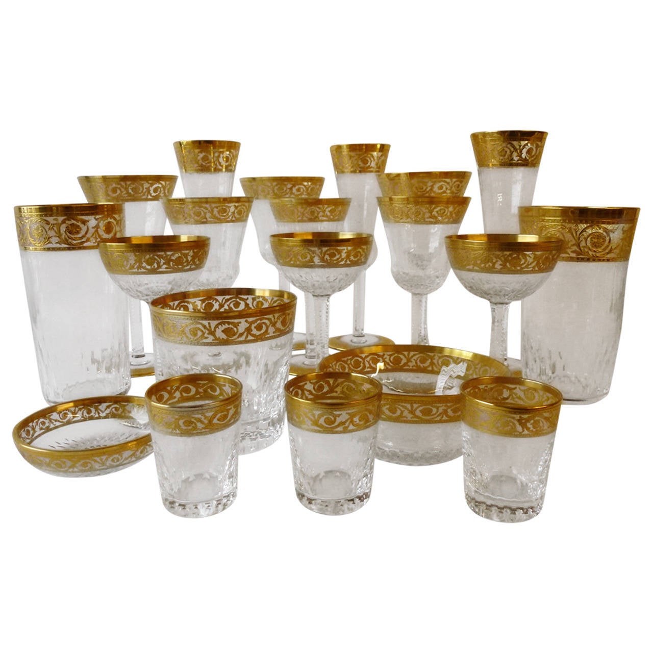 An extensive St. Louis Thistle pattern gilt crystal table service at ...
