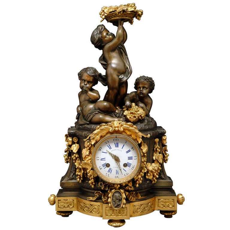 Antique French Figural Clock By Raingo Freres Paris at 1stDibs