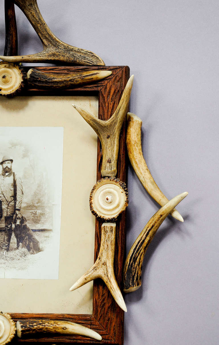 Black Forest Frame with Antlers and Antique Photo of Hunter with Game ...