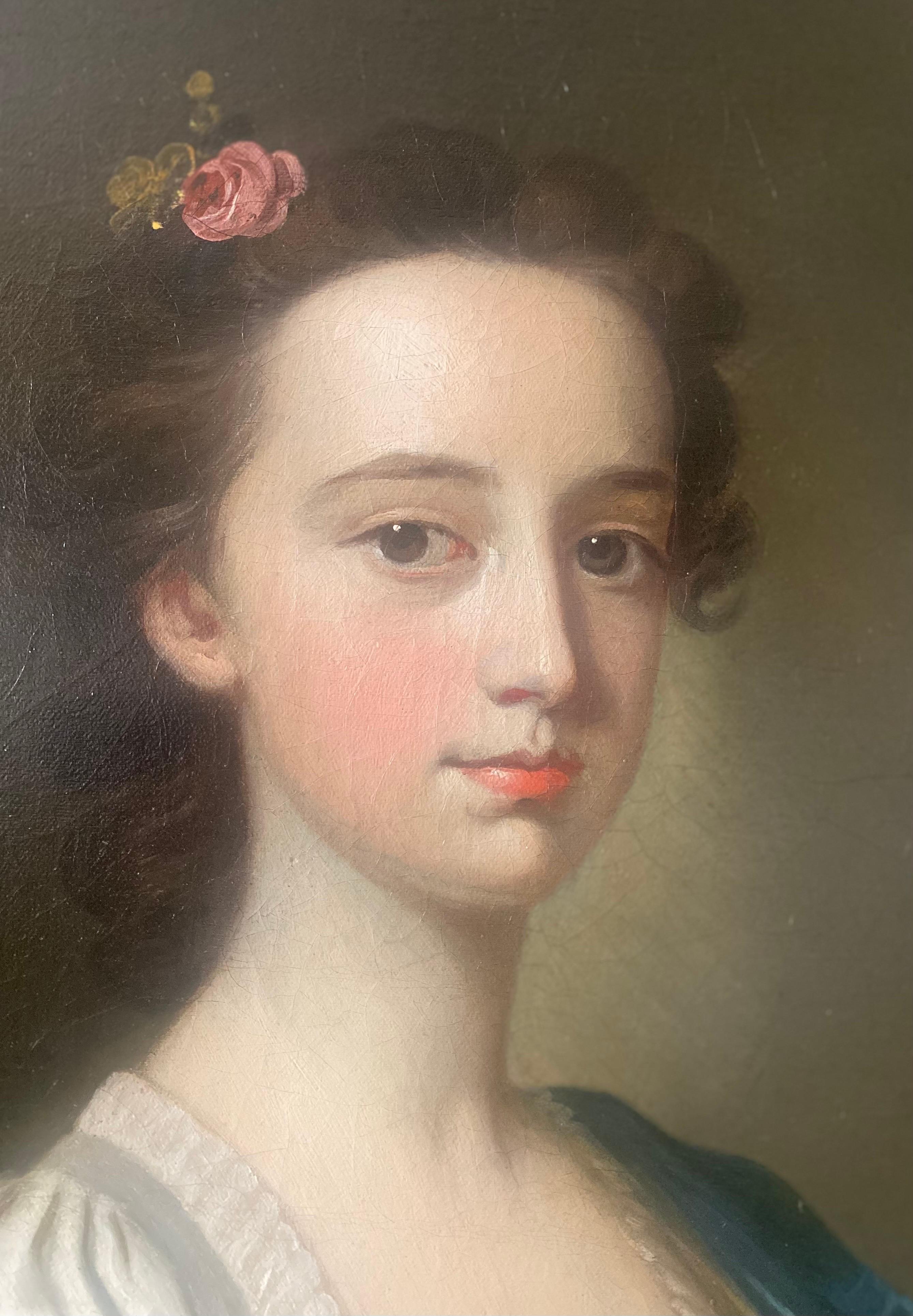 18th century portrait of a young lady in an ivory silk gown and blue ...