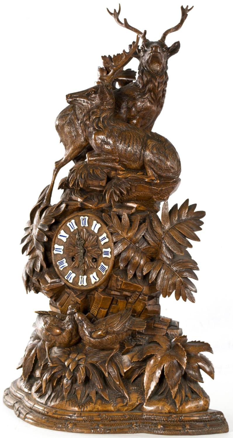 A Large Black Forest Mantel Clock with Red Stags and Game Birds at 1stdibs