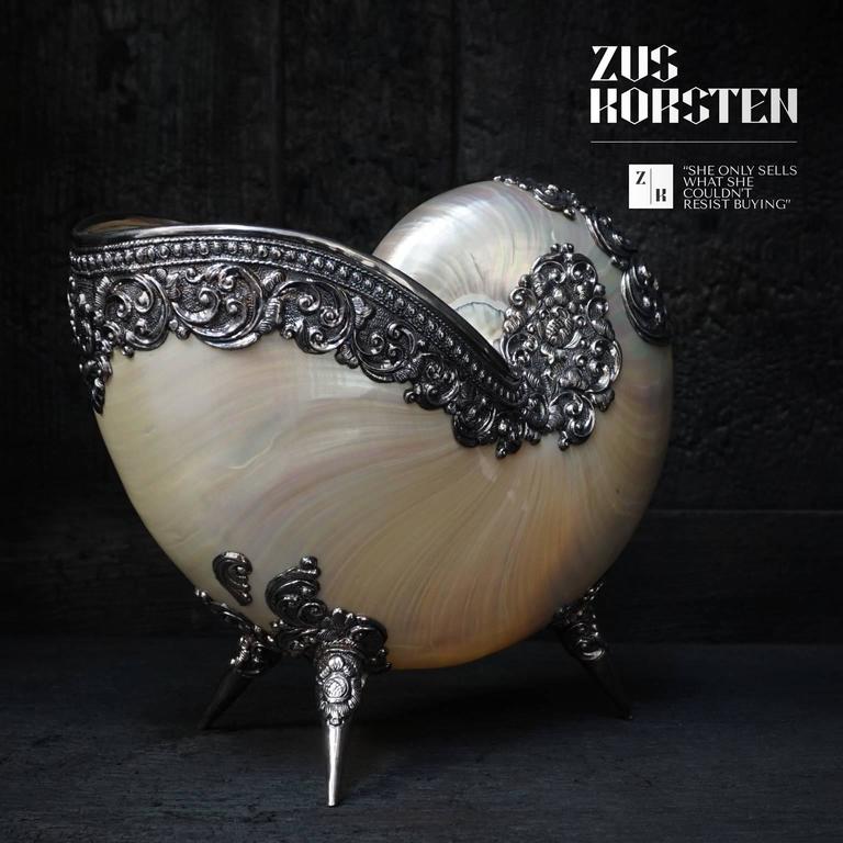 Large Pearlescent Nautilus Shell with Repoussé Silver at 1stDibs