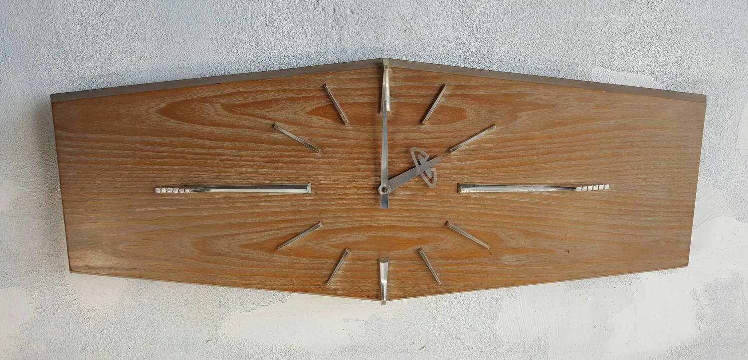 Modernist Cursed Oak Wall Clock by Lanshire For Sale at 1stdibs