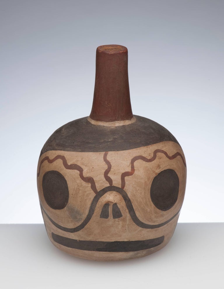 Pre-Columbian Nazca Polychrome Skull Bottle at 1stDibs