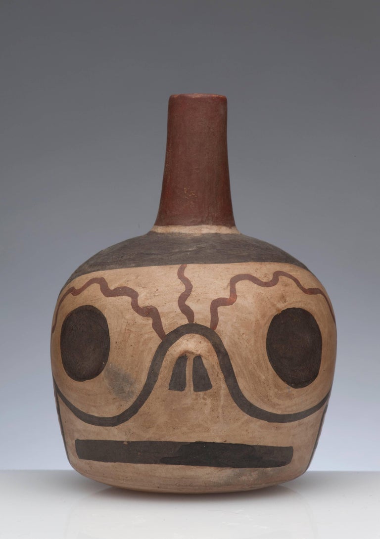 Pre-Columbian Nazca Polychrome Skull Bottle at 1stDibs
