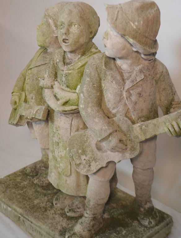 Carved Stone Statue of Children Standing and Singing For Sale at 1stDibs