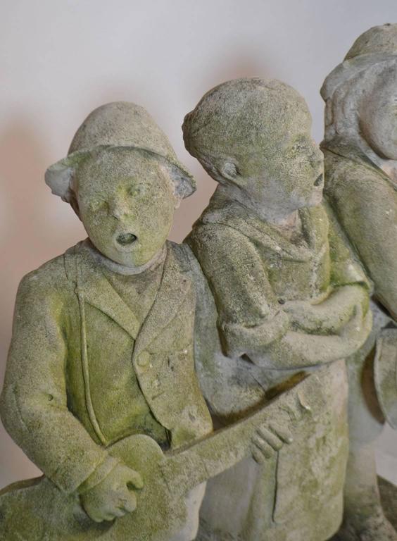Carved Stone Statue of Children Standing and Singing For Sale at 1stDibs
