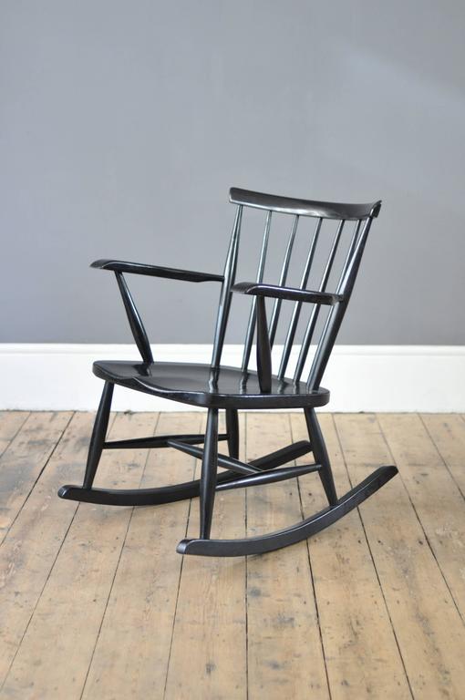 Mid-Century Spindle Back Rocking Chair For Sale at 1stDibs