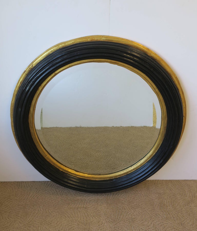 Midcentury Round Black and Gold Beveled Wall Mirror at 1stDibs