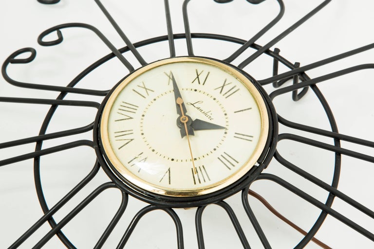 Lanshire Curled Iron Sunburst Clock, circa 1950 For Sale at 1stDibs ...