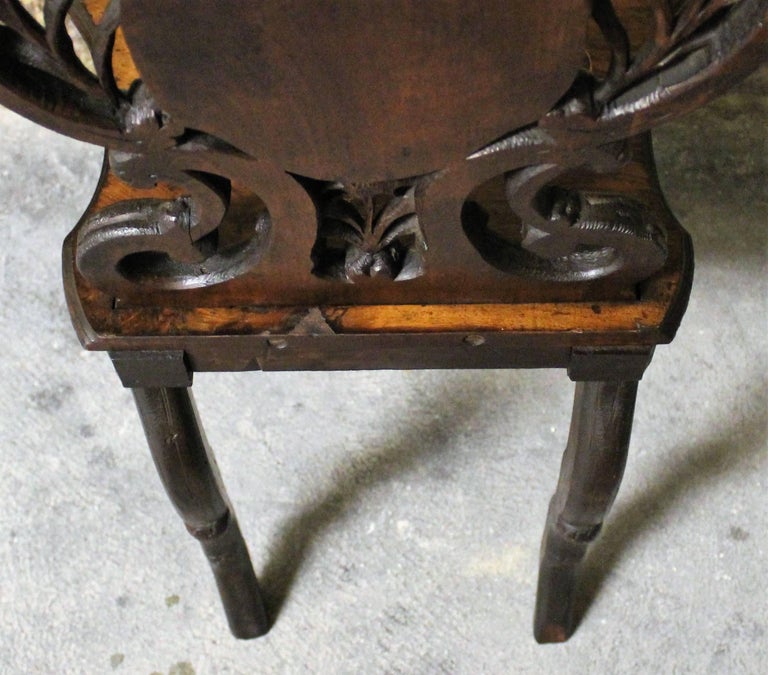 19th Century Black Forest Carved Chair with Inlay at 1stDibs