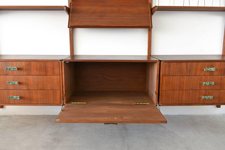 Walnut and Brass Shelving Wall Unit by Gerald McCabe, circa 1970 at 1stDibs