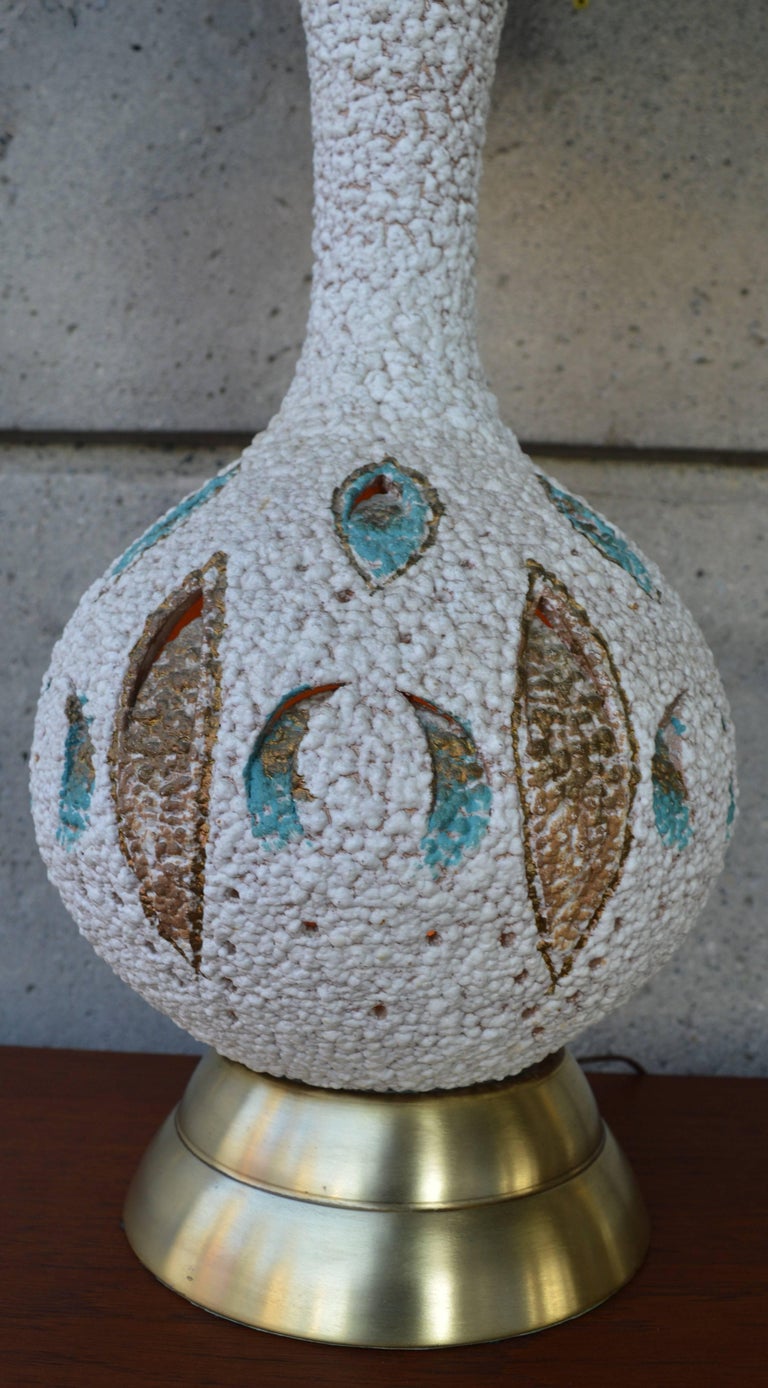 Mid-Century Modern Textured Ceramic Lamp with Leaf Cut-Outs and Lit ...