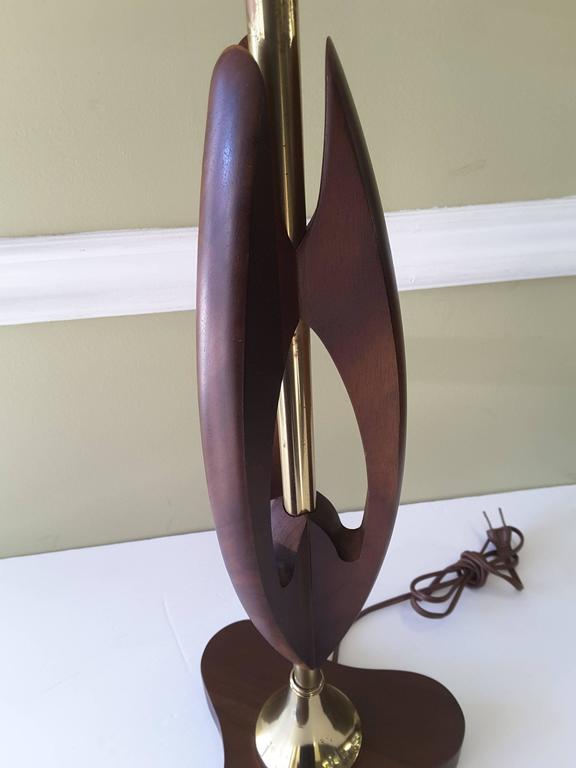 Mid-Century Symmetrical Brass and Teak Table Lamp For Sale at 1stDibs