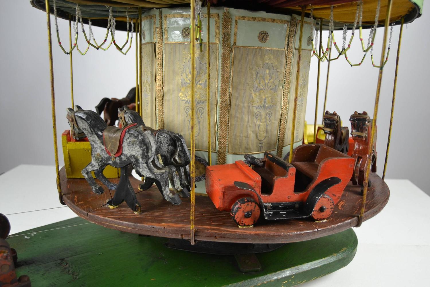 Antique Diecast Folk Art Merry-Go-Round Carousel For Sale at 1stdibs